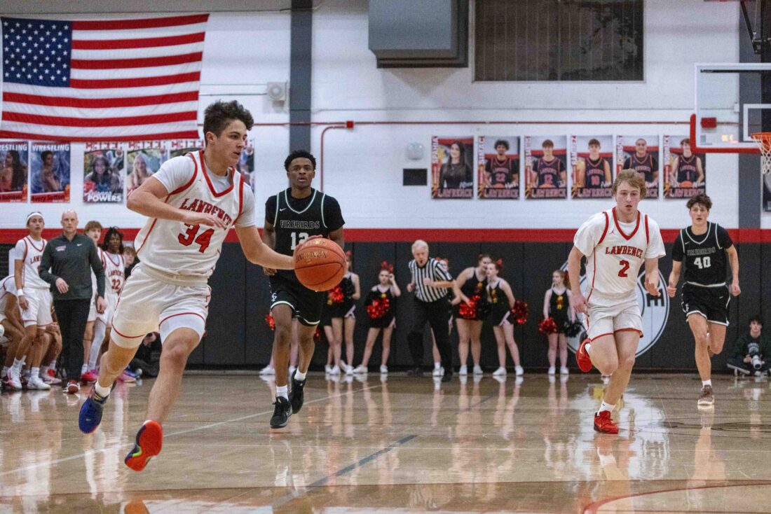 Growing pains from last season to help Lawrence boys basketball this ...